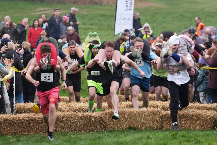 Finnish pair wins a barrel of ale in annual ‘wife-carrying’ contest in ...